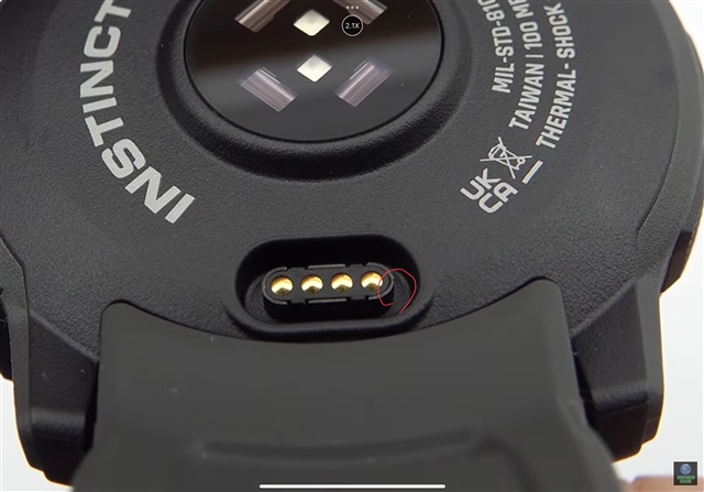 One side of the charging port is split. - Instinct 2 Series - Wearables ...