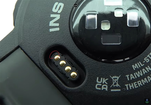 One side of the charging port is split. - Instinct 2 Series - Wearables ...